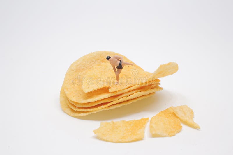 A Mni Sumo on the Potato Chips Stock Photo - Image of potato, macro ...