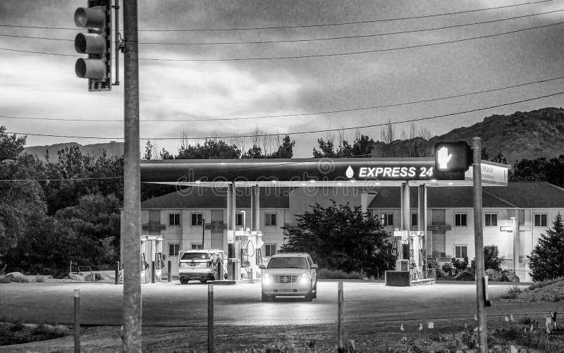 MOAB, UT - JUNE 22, 2018: Express 24 Gas Station Sign at Sunset ...