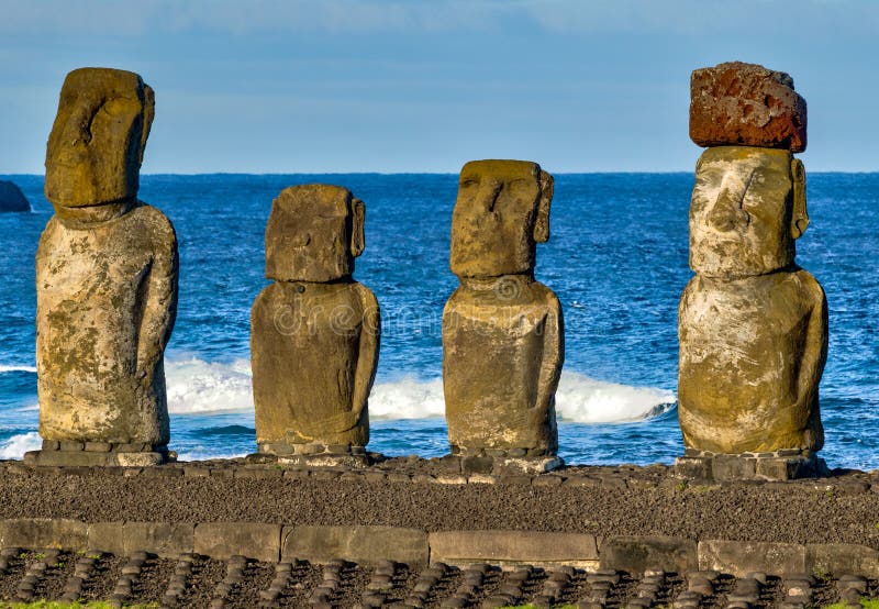 Moai on Easter Island with Red Topknot Hats at Anakena Ahu Stock Image ...