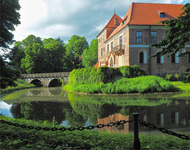 Castle, moat and bridge. stock image. Image of water - 187153319