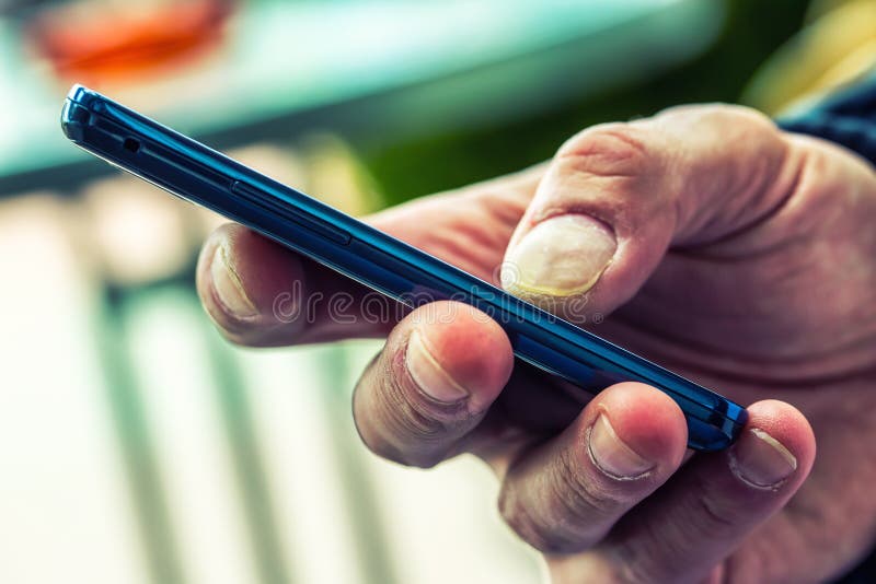 Mobil phone in the hand stock image. Image of industry - 40091225