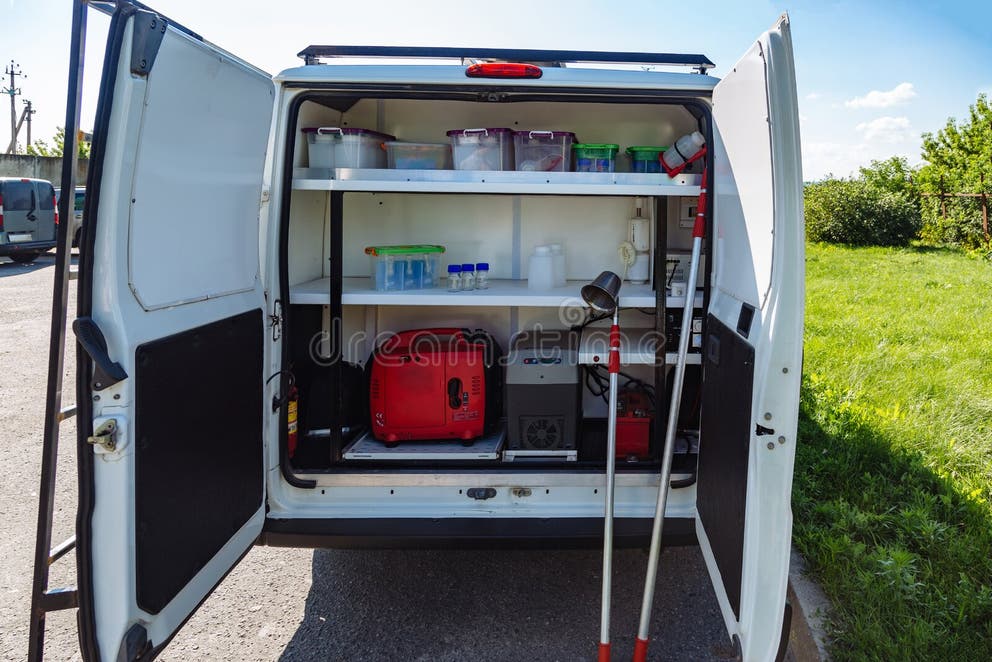 Mobile Analytic Laboratory in the Minivan Car, Boxes for Sampling Stock ...