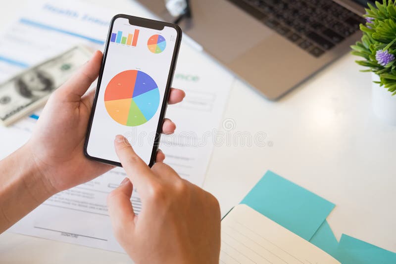 Mobile Analytics Smartphone on Business Hand with Showing Data. Stock ...