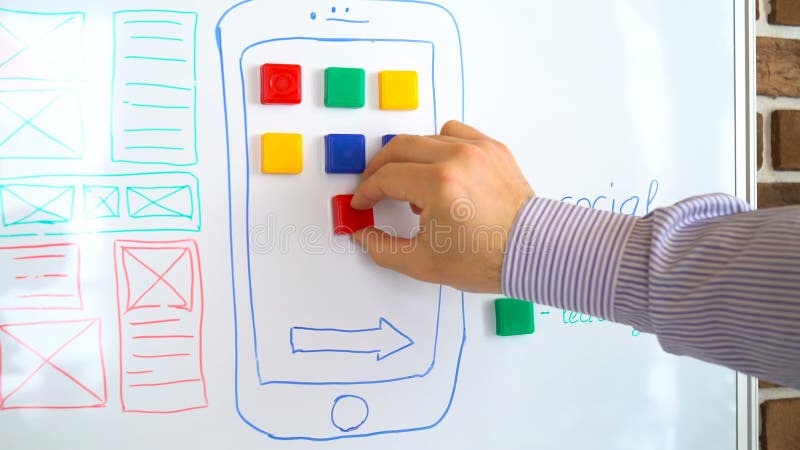 The Mobile Application Designer is Working on the Interface of the ...