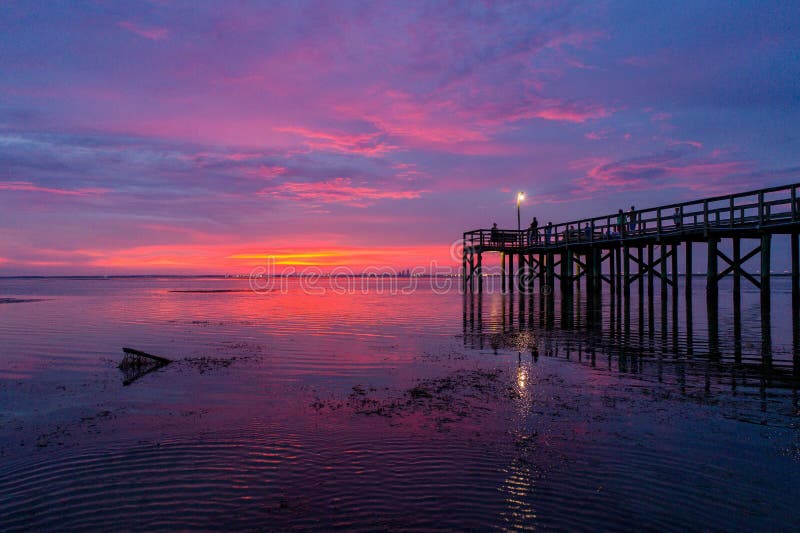 Mobile Bay at sunset stock image. Image of coast, beach - 254385235