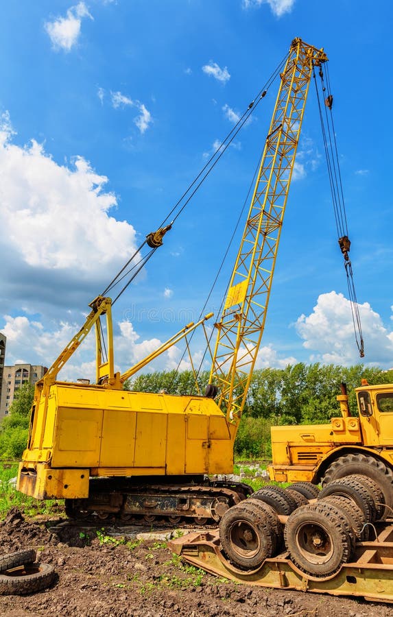 Caterpillar Crane on Construction Site Stock Photo - Image of logistics ...