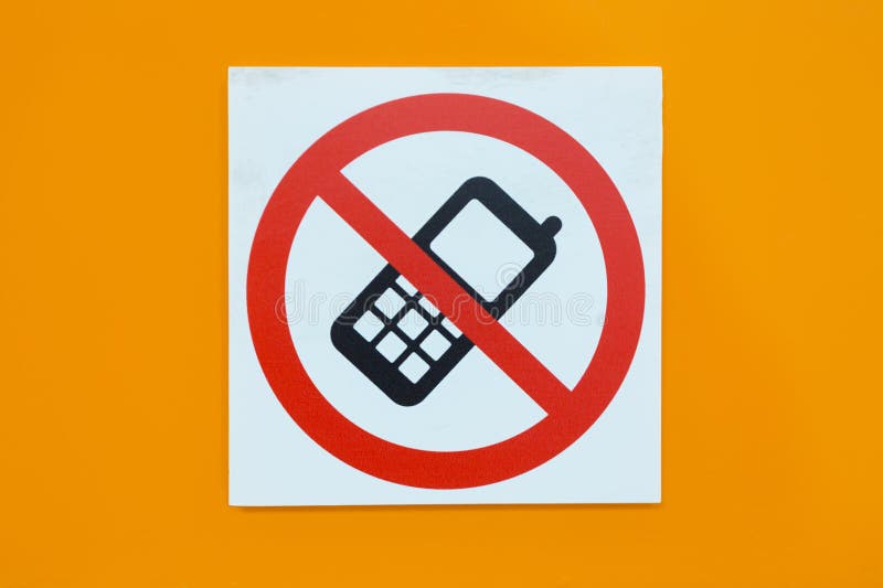 Mobile Cell Phones are Prohibited Sign on Orange Wall Stock Image ...