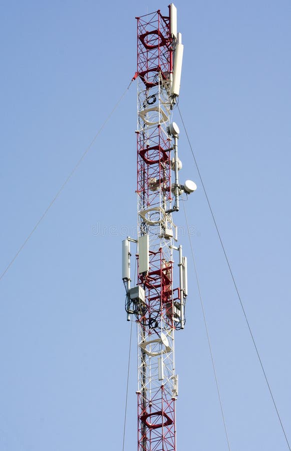 Aerial of Mobile Communication on a Background of a Blue Cloudy Sky ...