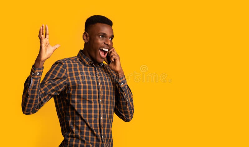 Mobile Communication Excited African American Guy Emotionally Talking