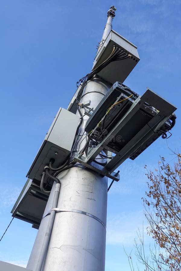 Mobile Communications Antenna Tower Against the Blue Sky Stock Photo ...