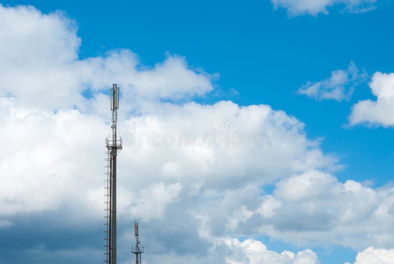 Mobile Communications Tower on the Sky Background. Large Clouds ...