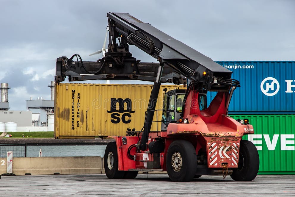 Mobile Container Handler in Action at a Container Terminal in the Port ...