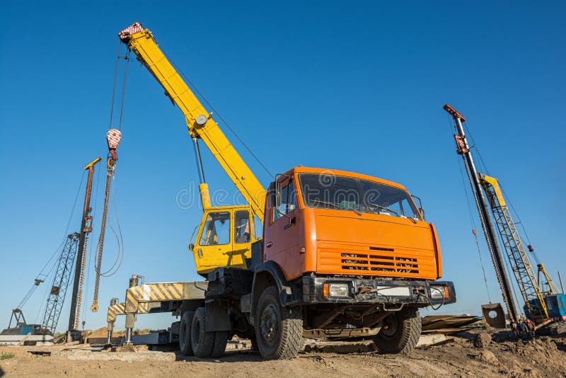 Mobile Crane at Construction Site Stock Photo - Image of lifting ...