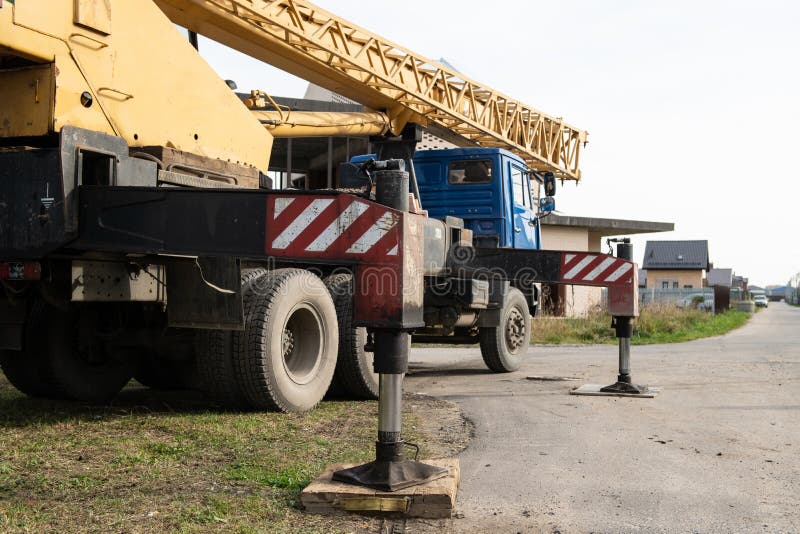 Mobile Crane on Construction Site Using Hydraulic Supports Stock Image ...
