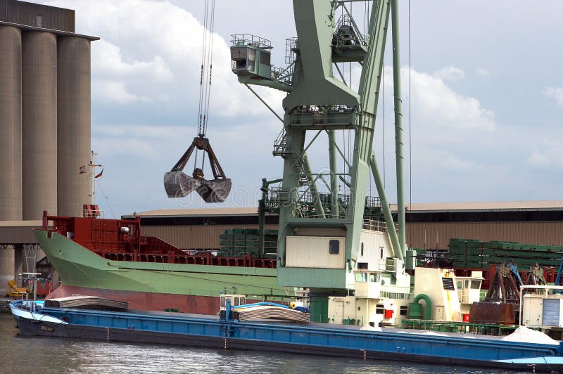 Mobile Crane Loading a Ship Stock Photo - Image of cranes, barge: 23424564