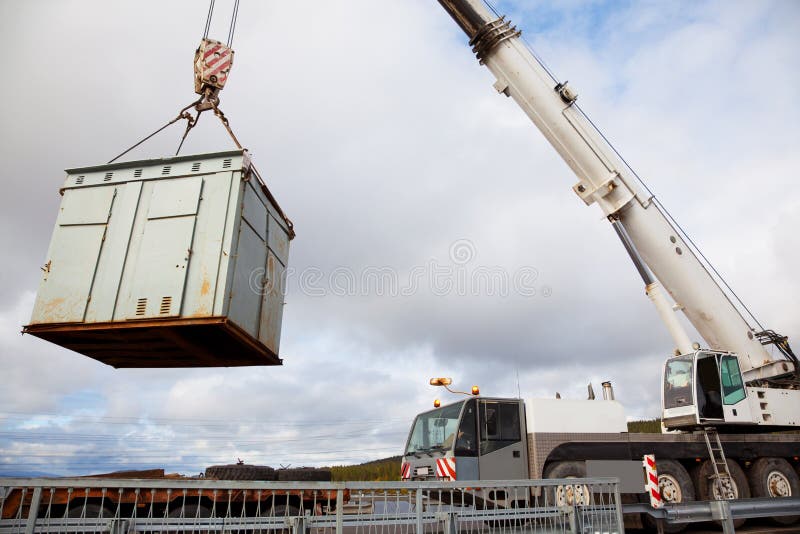 Mobile Crane Operating by Lifting an Electric Generator Stock Image ...