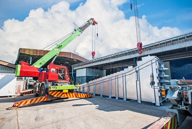 Crane Operating by Lifting and Moving an Heavy Electric Generator Stock ...
