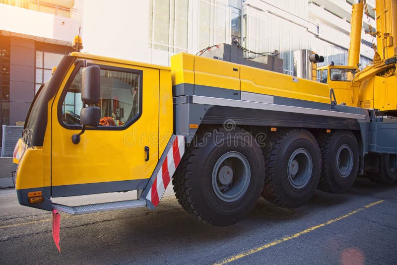 Mobile Crane at Work in Downtown Stock Photo - Image of capacity, beam ...