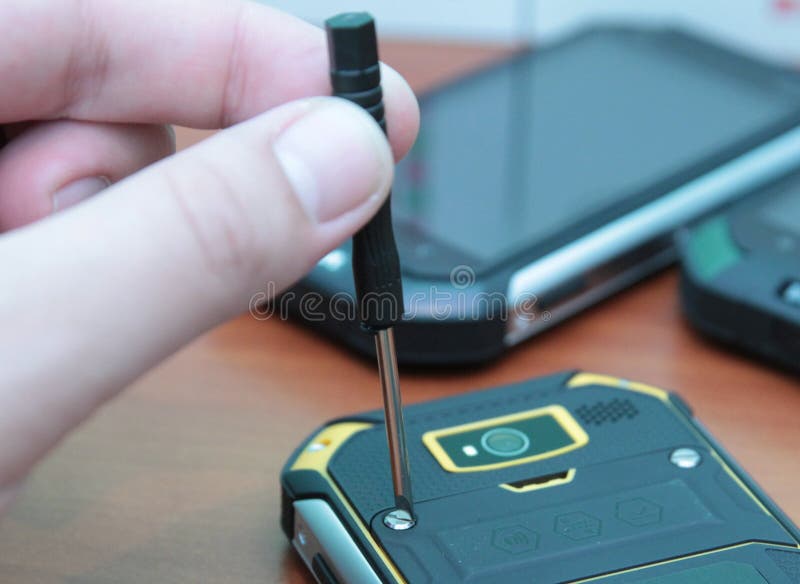 Mobile Devices Service and Repair Workshop Concept. Stock Photo - Image ...