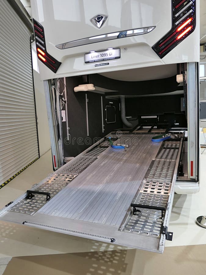 Mobile Garage with Loading Ramp on High End Luxurious Modern German ...