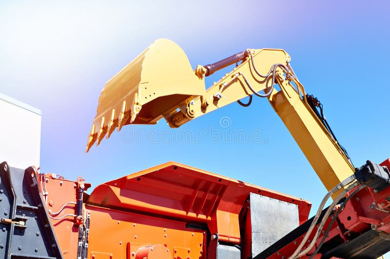 Mobile Impact Crusher and Bucket Excavator Stock Image - Image of ...
