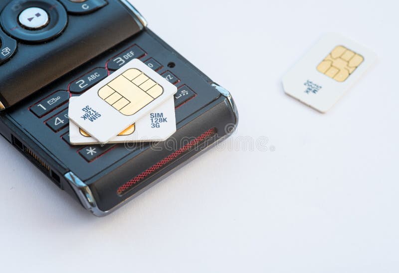 Mobile Memory Sim Cards on a Mobile Phone Stock Photo - Image of module ...