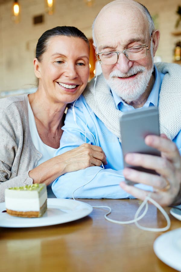 Seniors with smartphone stock image. Image of smartphone - 72233365