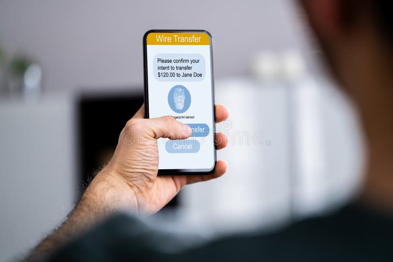Mobile Phone App To Authenticate Bank Transfer Stock Photo - Image of ...