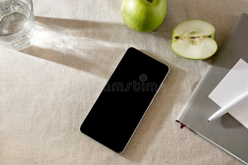 Mobile Phone on Beige Table with Apples and Sunlight Shadows, Business ...