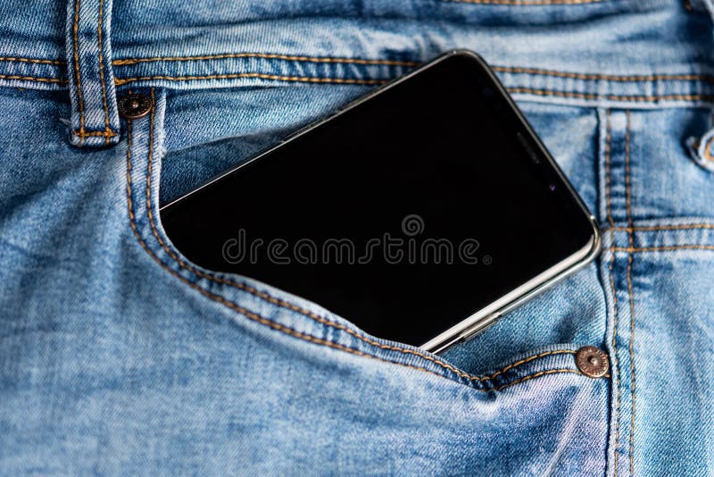 Mobile Phone with Black Screen for Copy Space in the Pocket of Jeans ...
