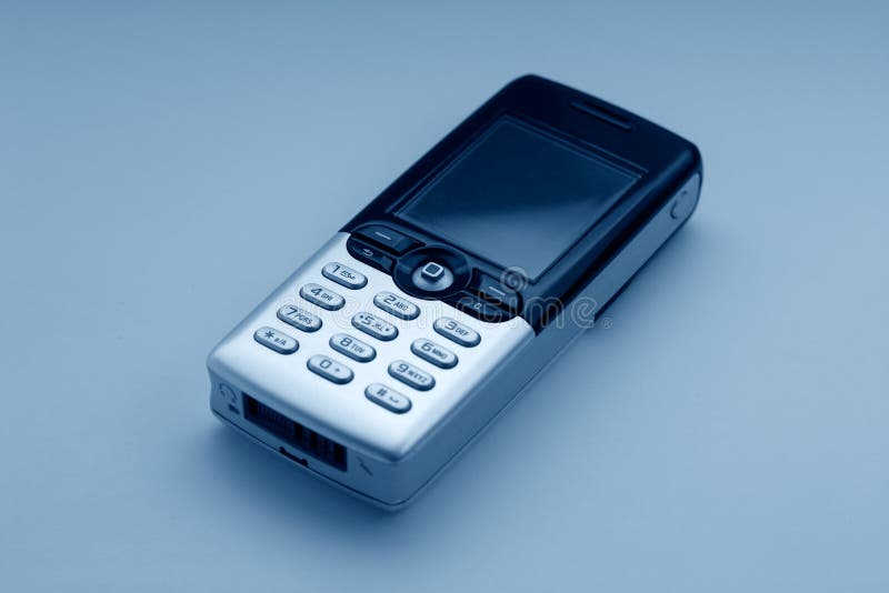 Mobile phone - blue tone stock photo. Image of company, analog - 44224