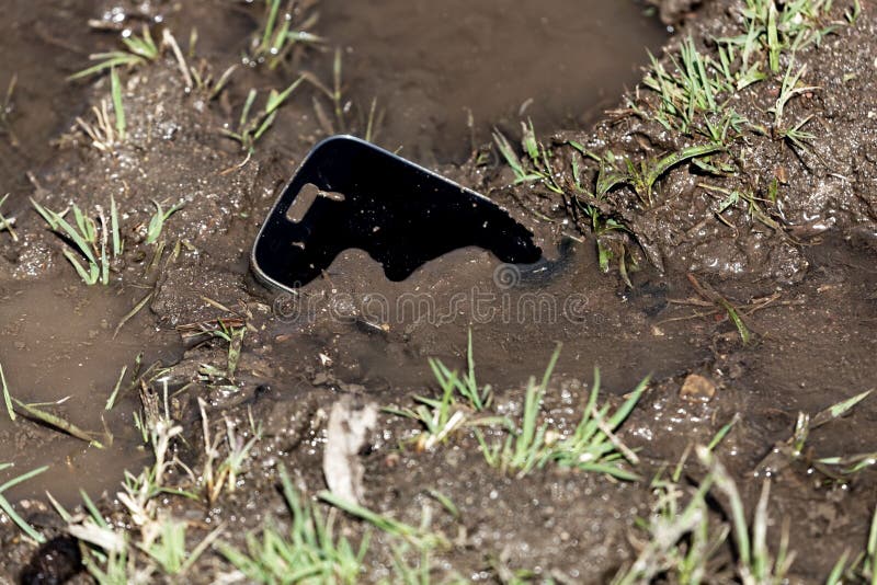 Mobile Phone in Brown Mud with Water Stock Photo - Image of pattern ...