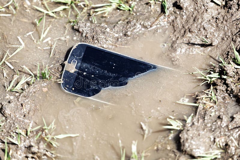 Mobile Phone in Brown Mud with Water Stock Image - Image of concept ...