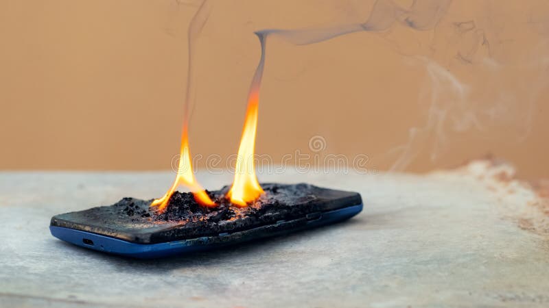 A Mobile Phone Burned in the Fire Stock Photo - Image of burn, accident ...