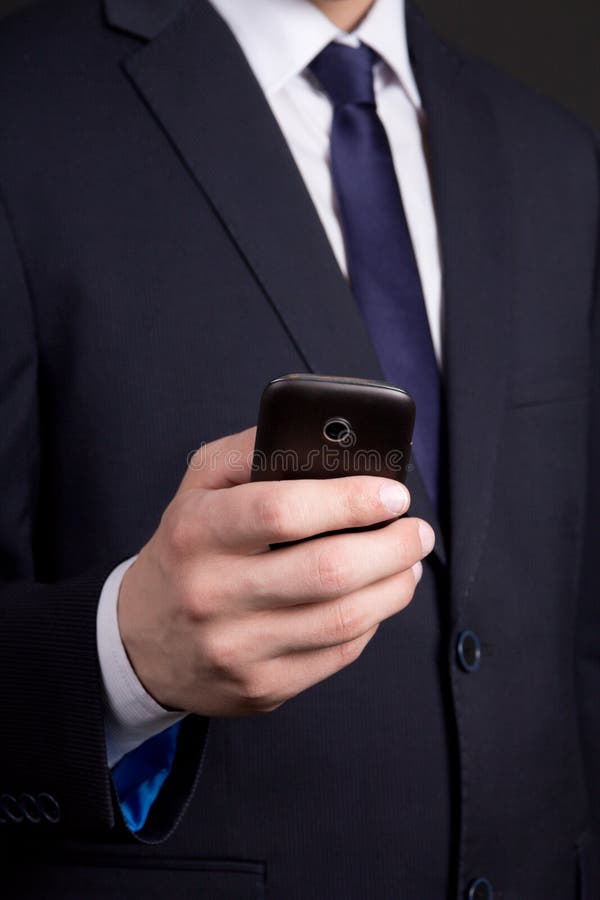 Typing on cell phone stock image. Image of adult, handsome - 14623623