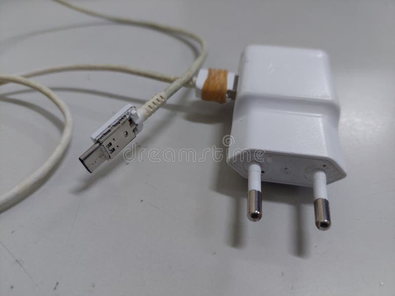 Mobile Phone Charger on White Work Table Stock Image - Image of energy ...