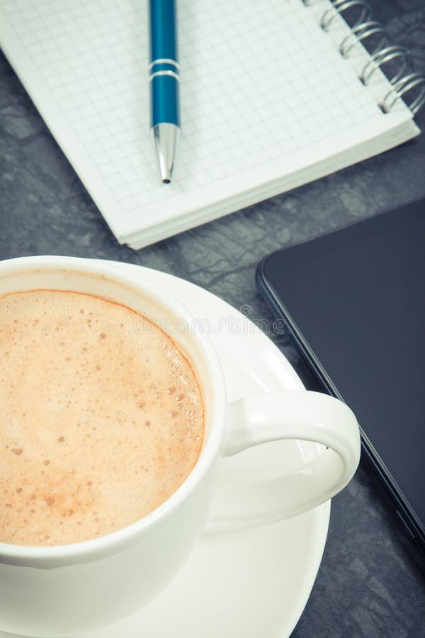 Mobile Phone, Coffee with Milk and Notepad for Writing Notes. Work or ...