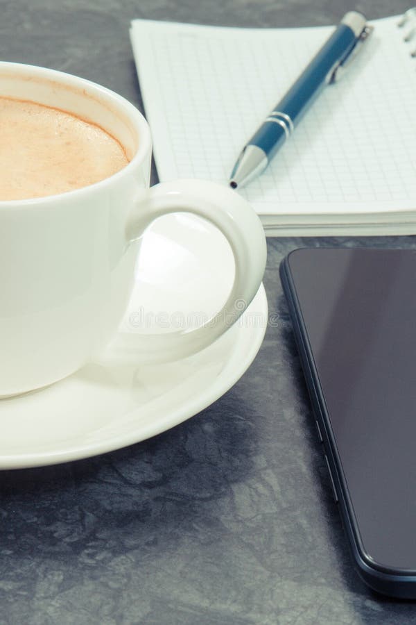 Mobile Phone, Coffee with Milk and Notepad for Writing Notes. Work or ...