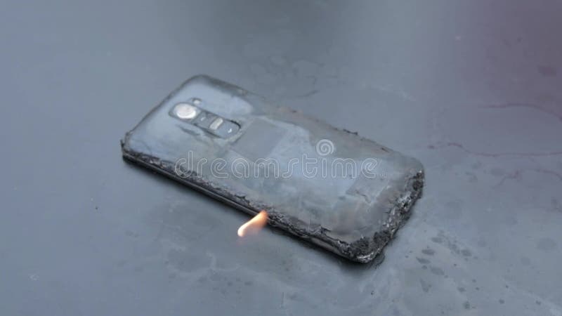 Mobile Phone Explodes and Burns. Cell Phone Explosion and Fire .Smart ...
