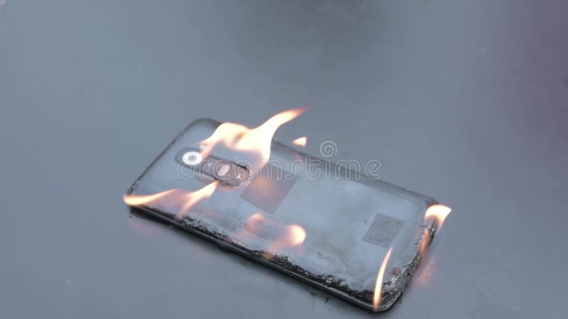 Mobile Phone Explodes and Burns. Cell Phone Explosion and Fire .Smart ...