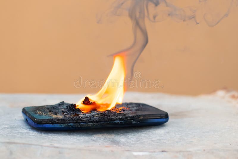 Mobile Phone in Fire and Smoke. Burned Mobile Phone Stock Photo - Image ...