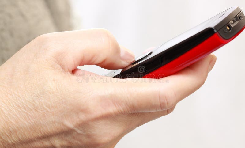 Mobile phone with hand stock photo. Image of close, mobilephone - 25468302