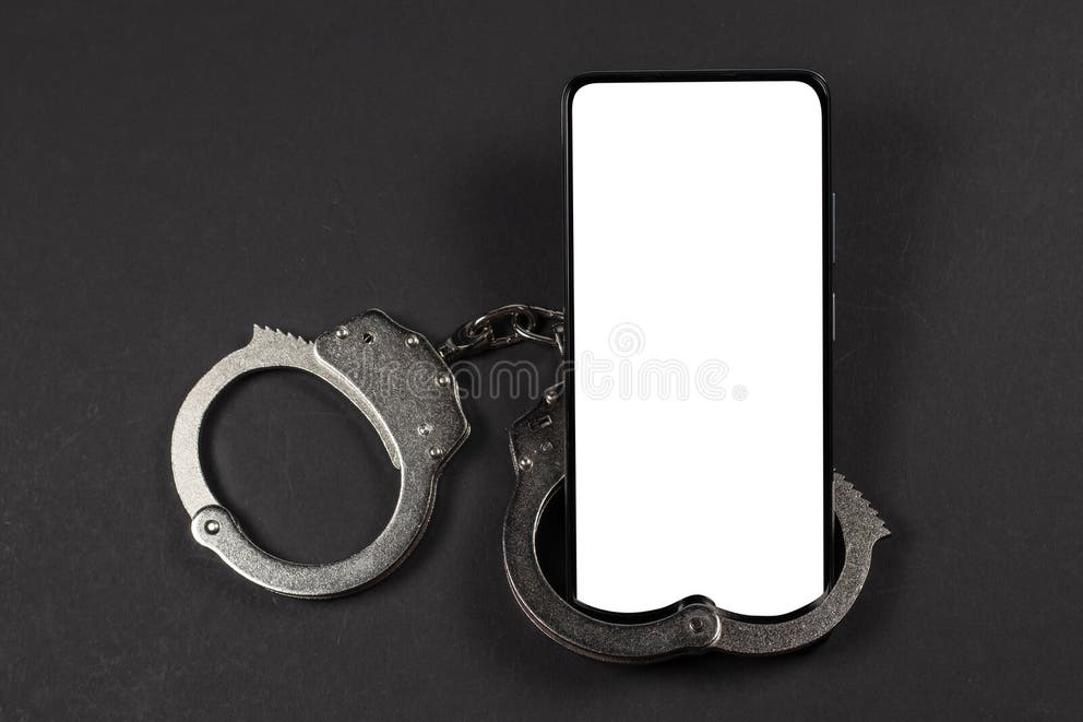 Mobile Phone with Handcuffs and White Screen, the Concept of Dependence ...
