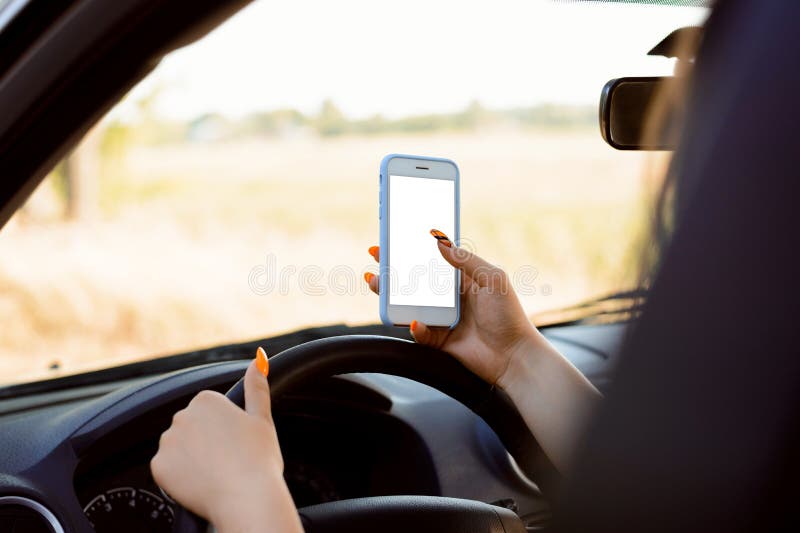 Mobile Phone in Hands of a Female Driver while Being in Intensive Rush ...