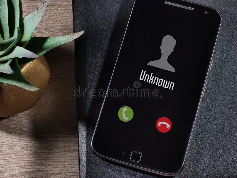 Unknown Caller. A Man Holds A Phone In His Hand And Thinks To End The ...