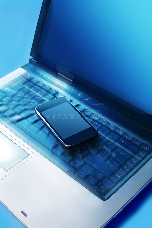Mobile Phone on the Keyboard Stock Photo - Image of communications ...