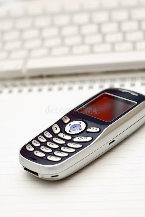 Mobile phone and keyboard stock photo. Image of white - 4289094