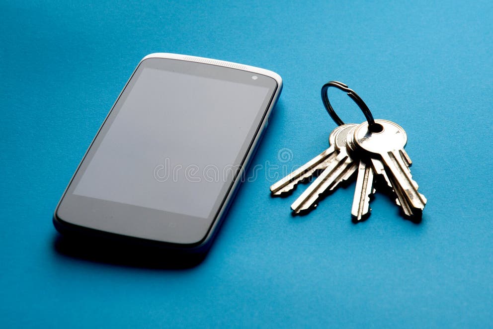 Mobile phone with a keys stock photo. Image of forbidden - 34367818