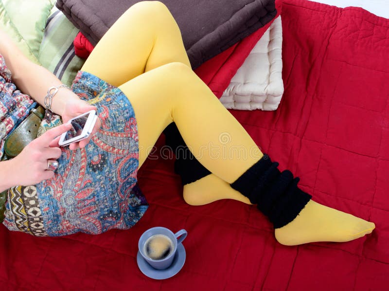 Mobile Phone on the Legs of a Young Woman Stock Image - Image of person ...