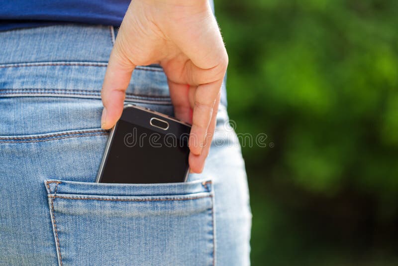 Mobile phone in pocket stock image. Image of message - 78103067